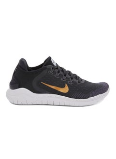 Nike Tanjun Lace Up Trainers Black/Metallic Gold UAE | Dubai, Abu Dhabi